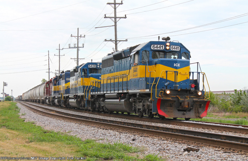 SD40-2s bring a freight into town